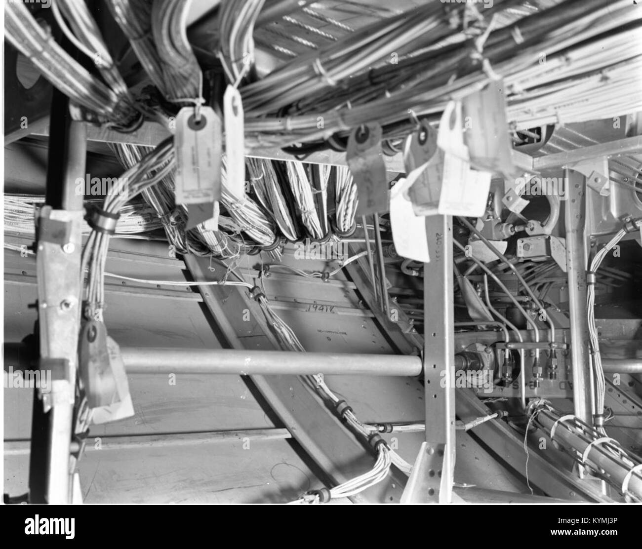 This historical photograph shows a Convair aircraft, likely from the ...