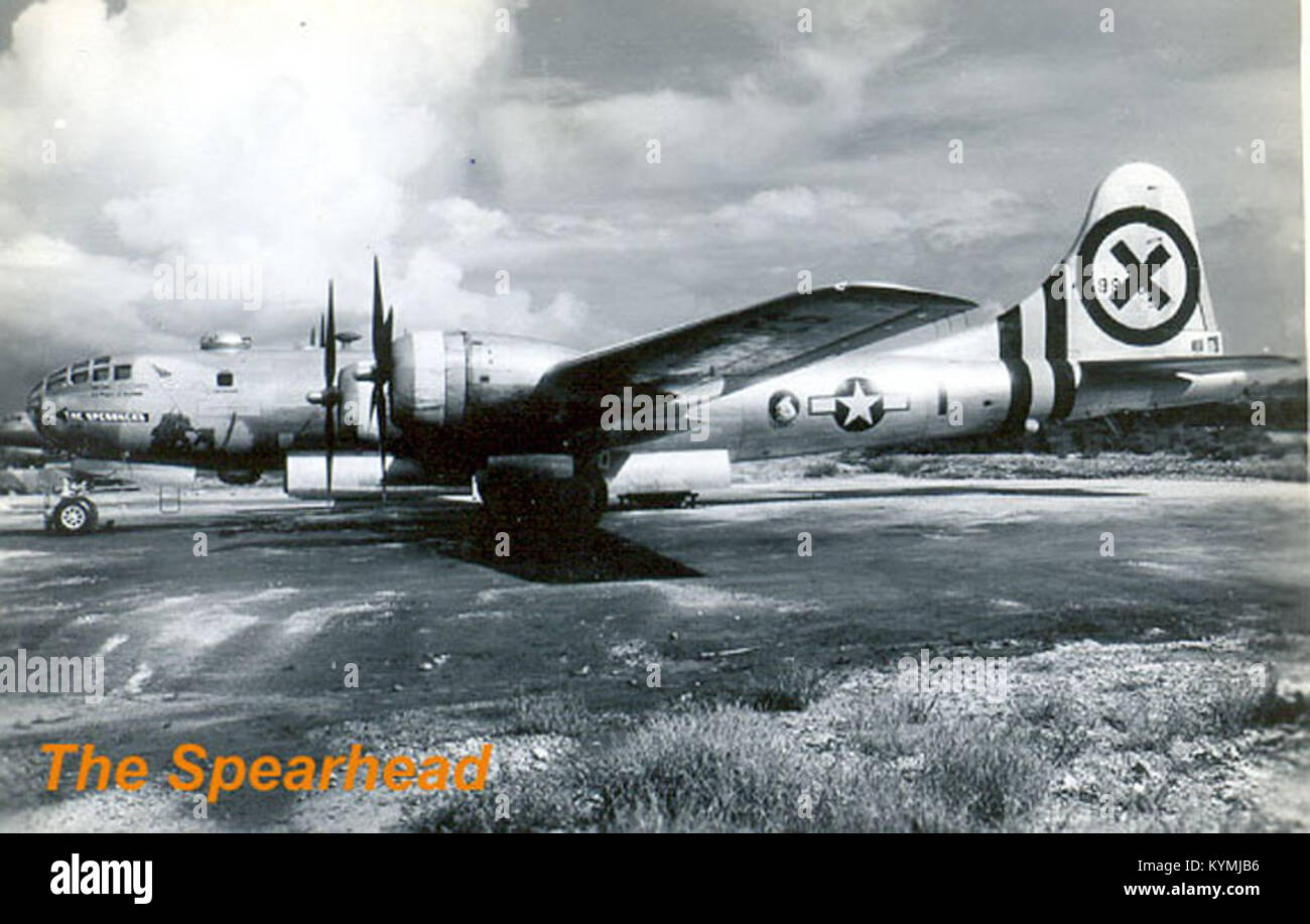 Photograph showing personnel and aircraft from the 9th Bomb Group ...