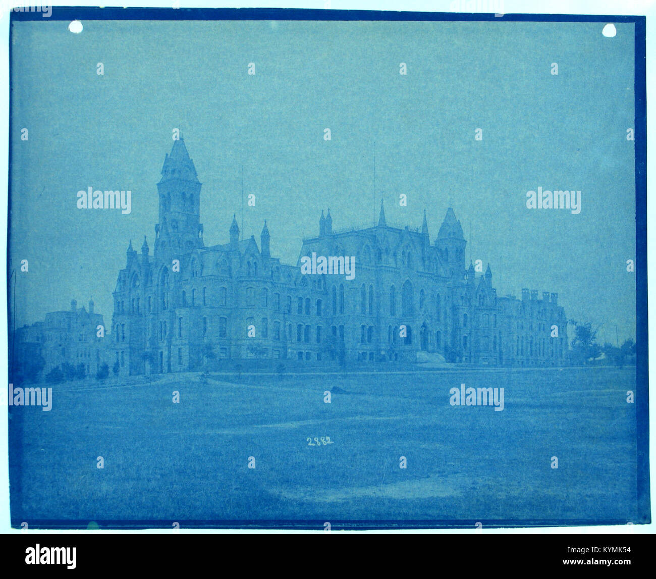 An old illustration of a mansion with a bell tower and spires ...