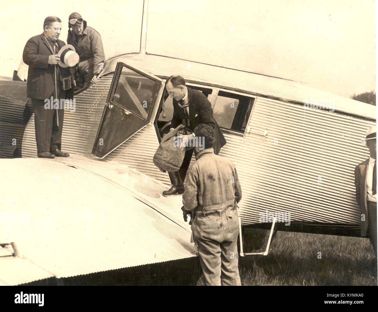A historical photograph of airmail being loaded for a pathfinding ...
