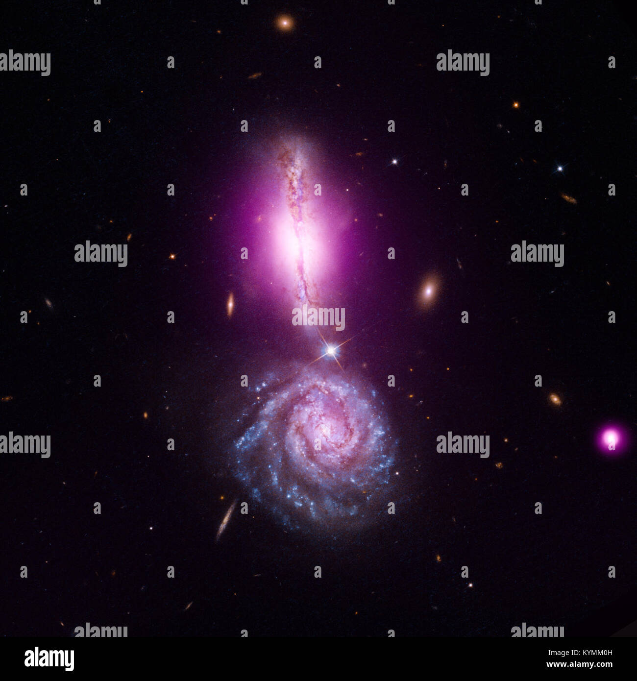 Photograph of a pair of galaxies, captured by the Smithsonian ...