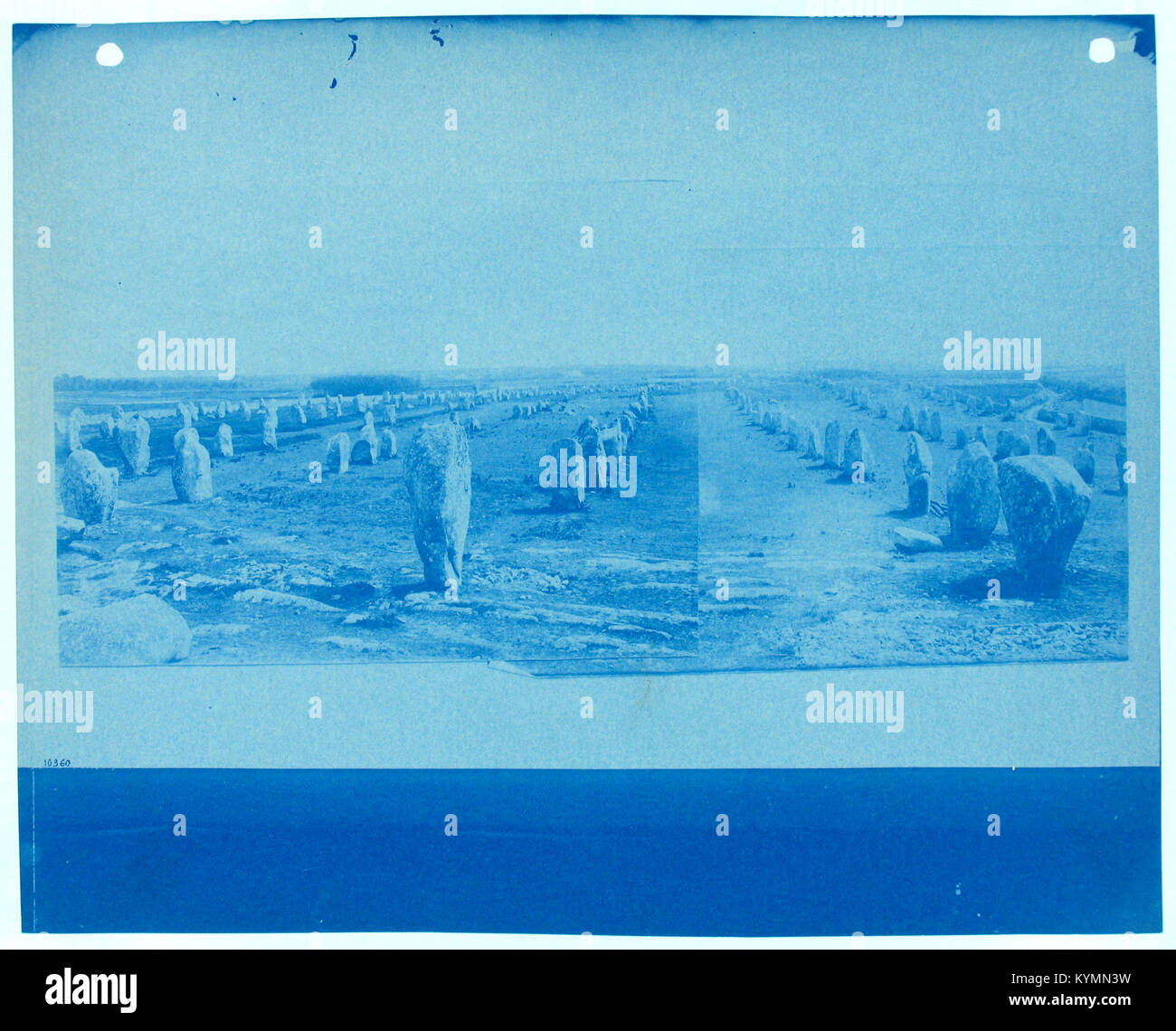 This image shows the megalithic stones of Carnac, France, arranged in a ...