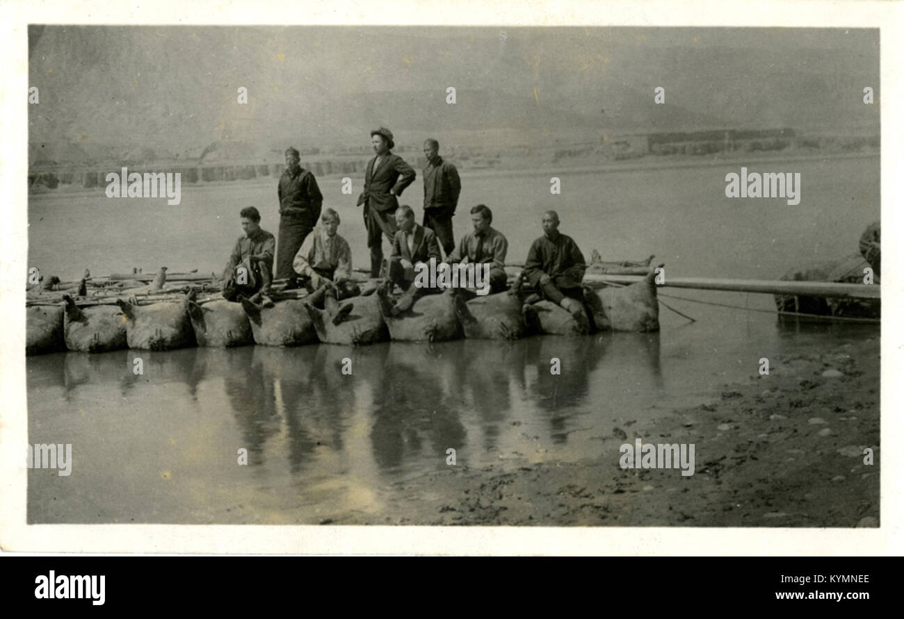 Photograph depicting a small raft with a group of Russians in China ...