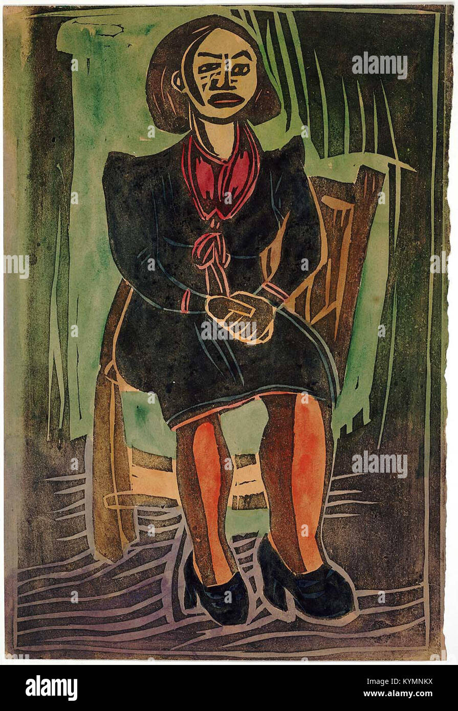 Photograph of a model sitting in a poised position, captured for ...