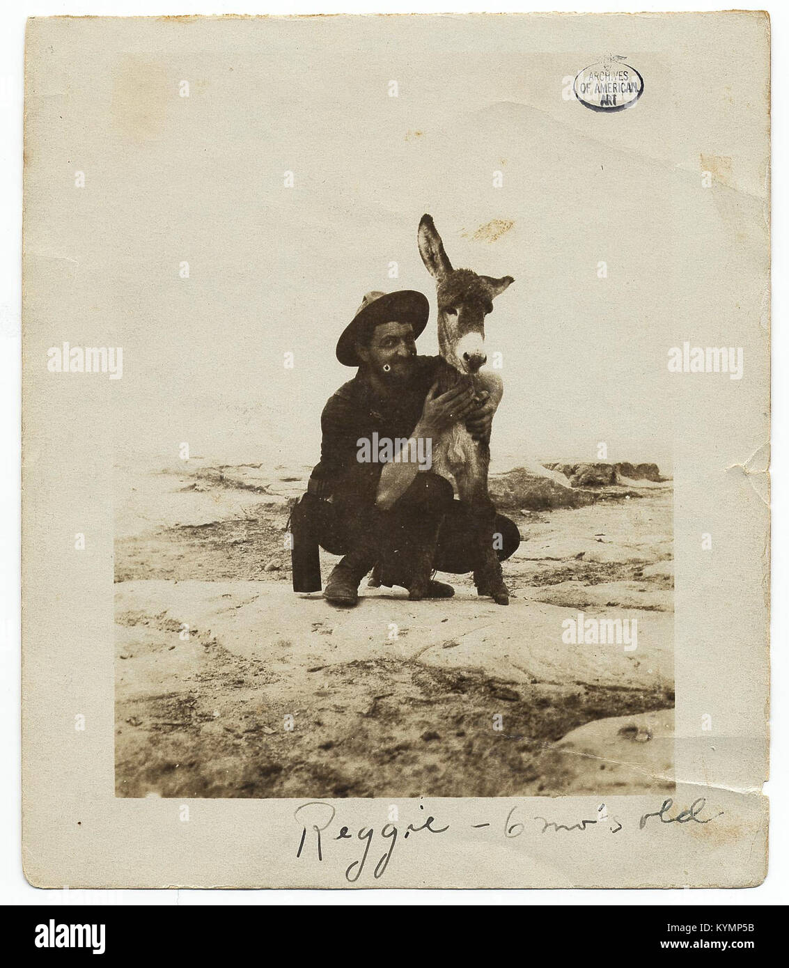 Alfred Lenz pictured with Reggie the burro, showcasing a moment in ...