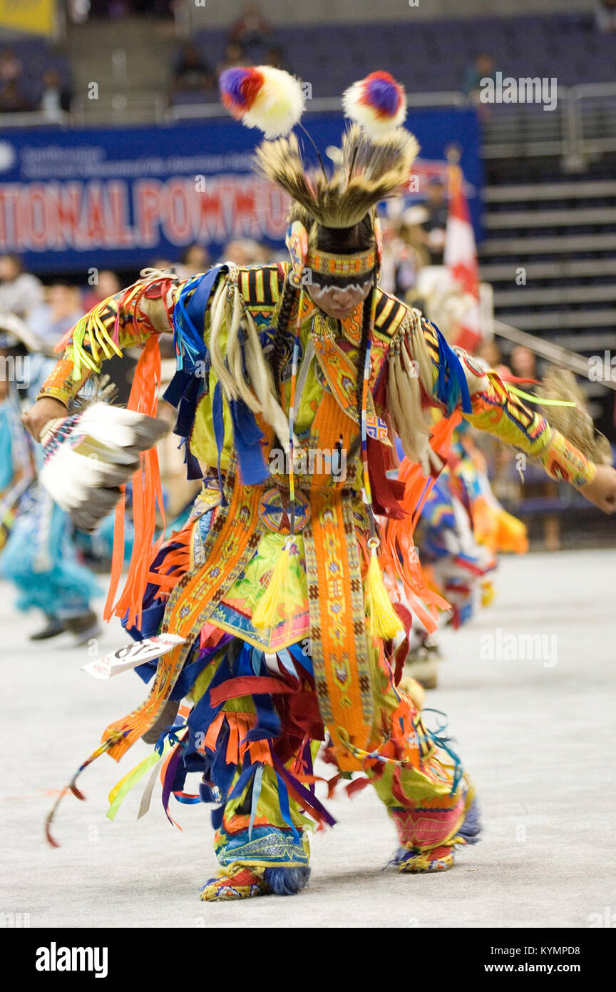 A photograph from a 2005 powwow, featuring a dancer in traditional ...