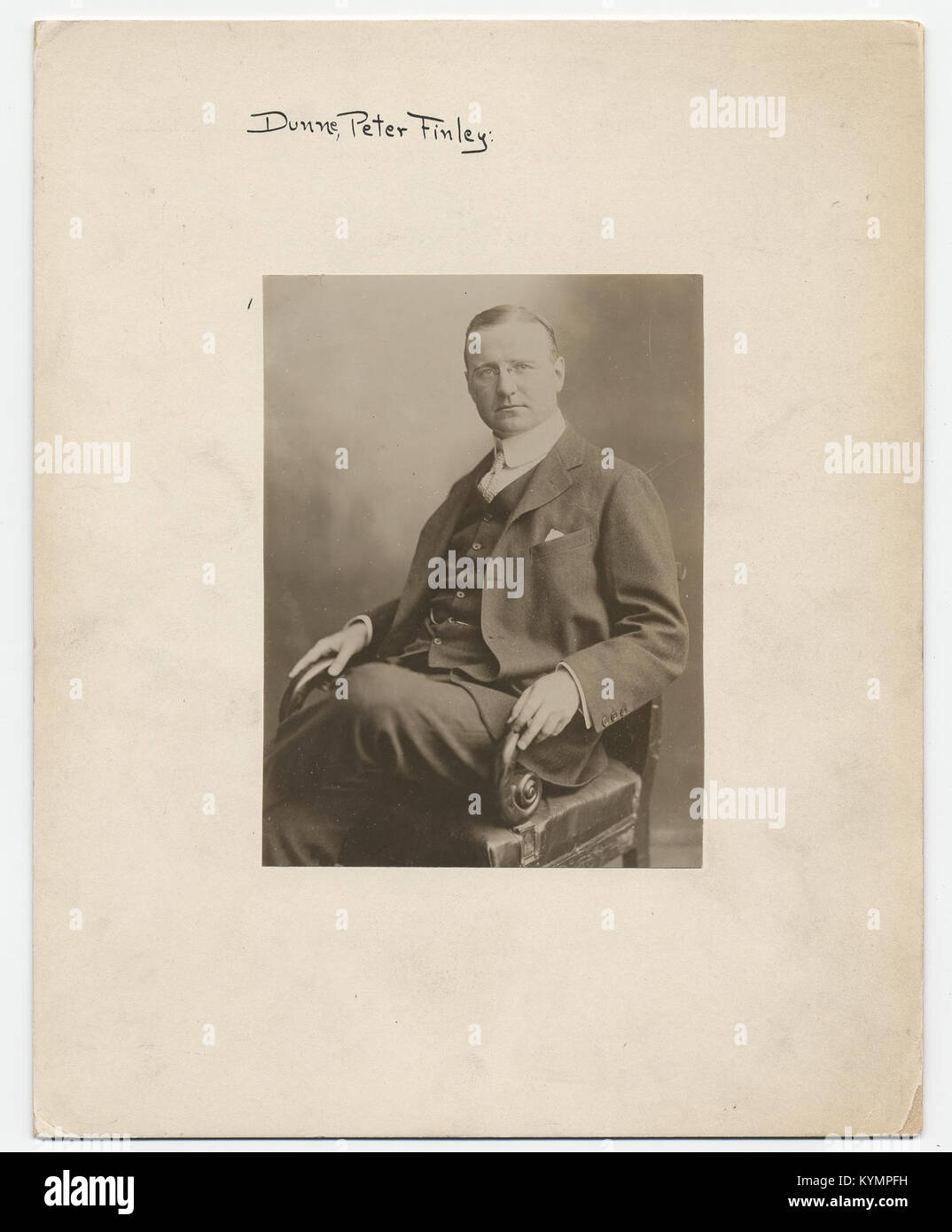 Portrait of Peter Finley Dunne, captured in a three-piece suit, held in ...