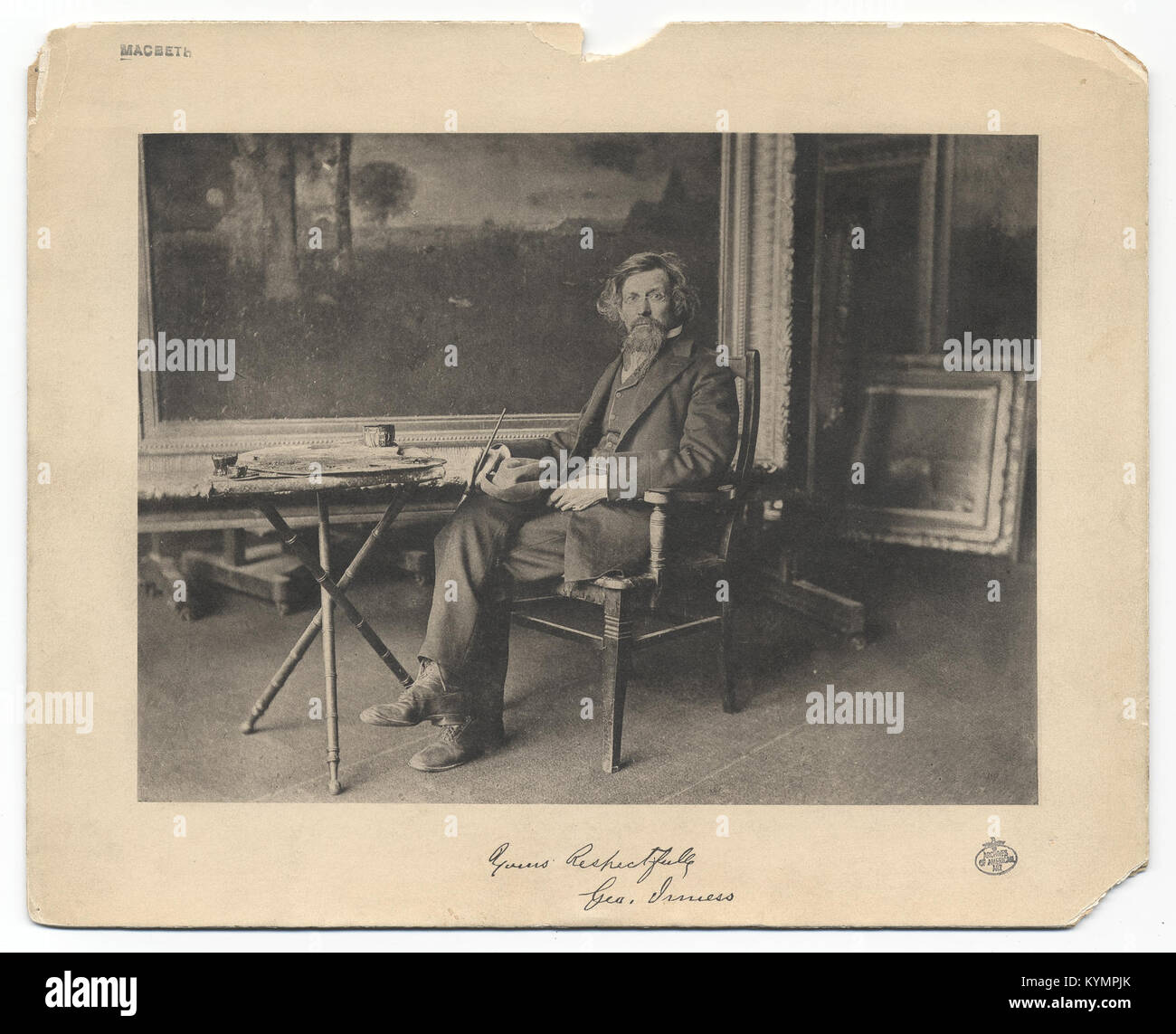 A portrait of artist George Inness seated in his studio in the late ...