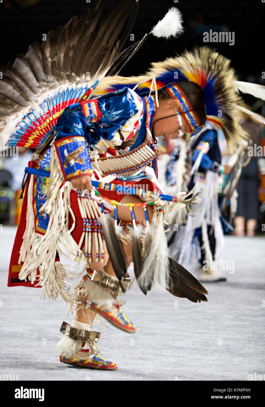 A young Native American man competes in a fancy dance at the 2007 ...