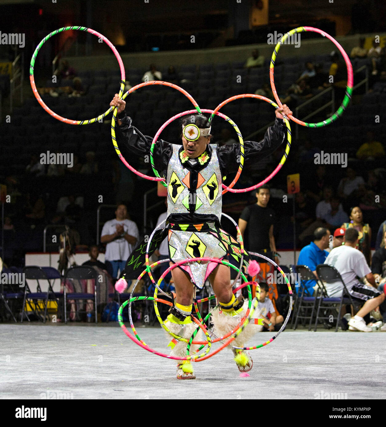 Photograph of a hoop dancer at a Powwow, captured in a historic moment ...