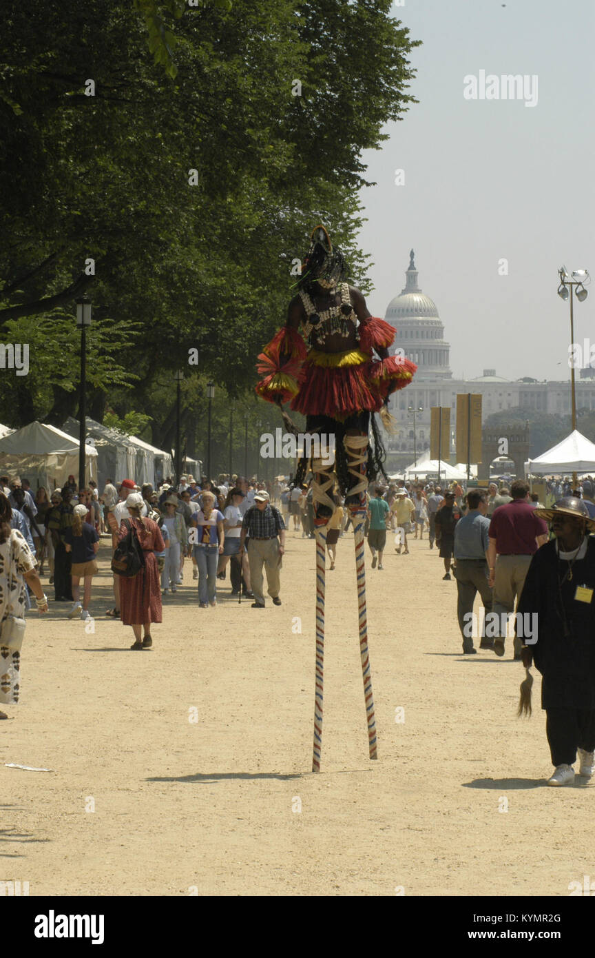 A photograph of a Dogon cultural procession in Washington D.C ...