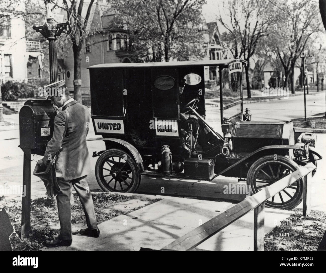 Letter carrier collecting mail hi-res stock photography and images - Alamy