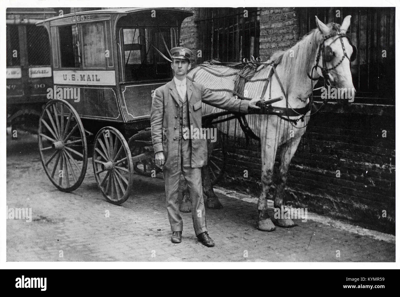 This image shows the City Collection Wagon, a horse-drawn postal cart ...