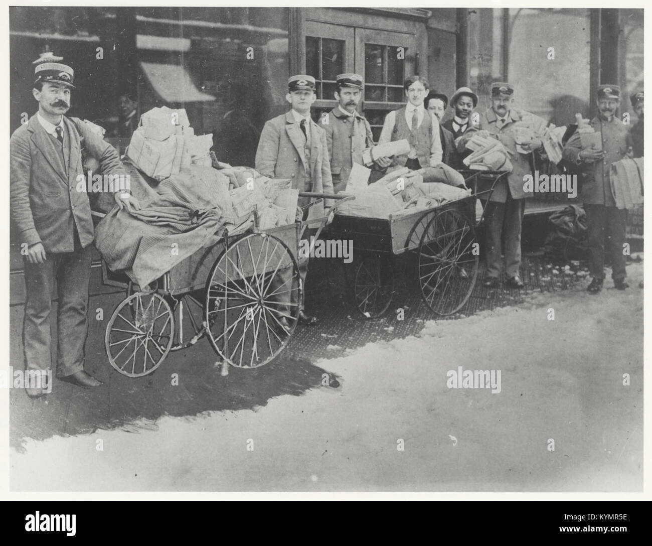 A historical photograph from the 1880s showing letter carriers using ...