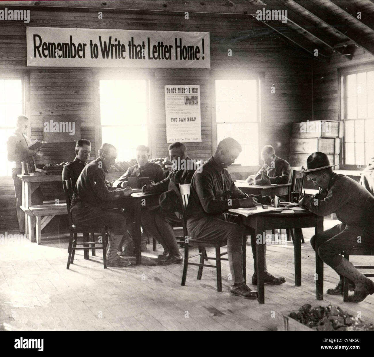 This historical image depicts soldiers writing letters home during ...