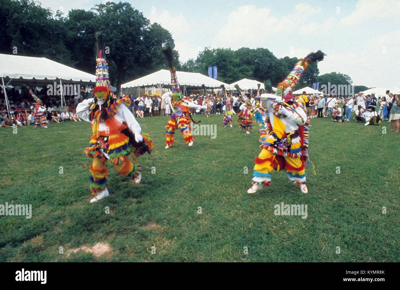 A colorful scene of Goombay dancers at a festival in Bermuda ...