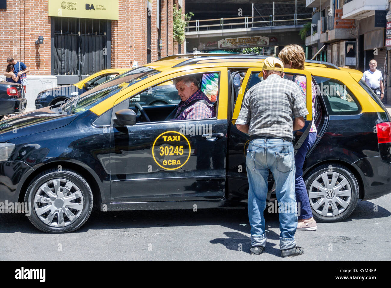 Buenos Aires Argentina,taxi,cab,driver,boarding,yellow,GCBA license ...