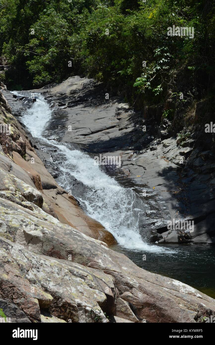 Crystal clear and inviting cascades at the wheel of fire, Finch Hatton ...