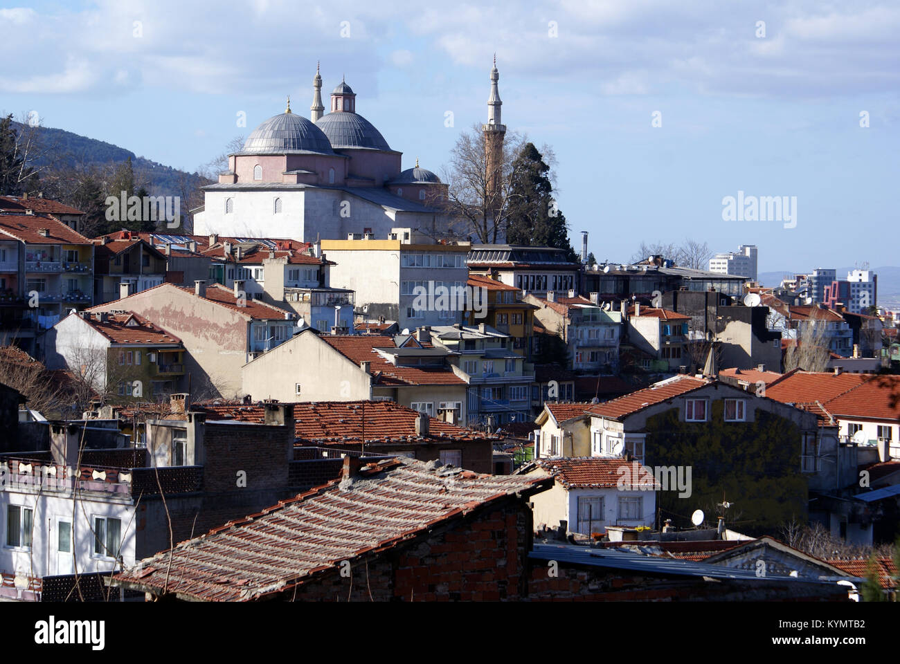 Mosque Eshil Jami and houses of Bursa, Turkey Stock Photo - Alamy