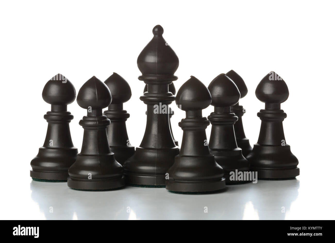 Runner chess figure standing in between pawn chess figures - management ...