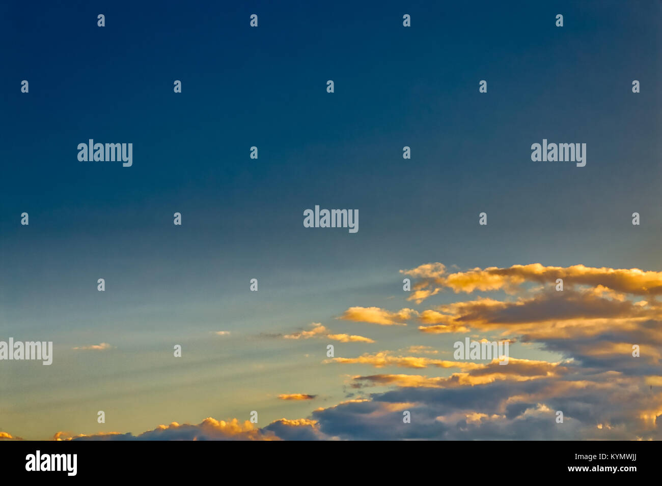 blue hour on clouds in sunset sky background Stock Photo - Alamy