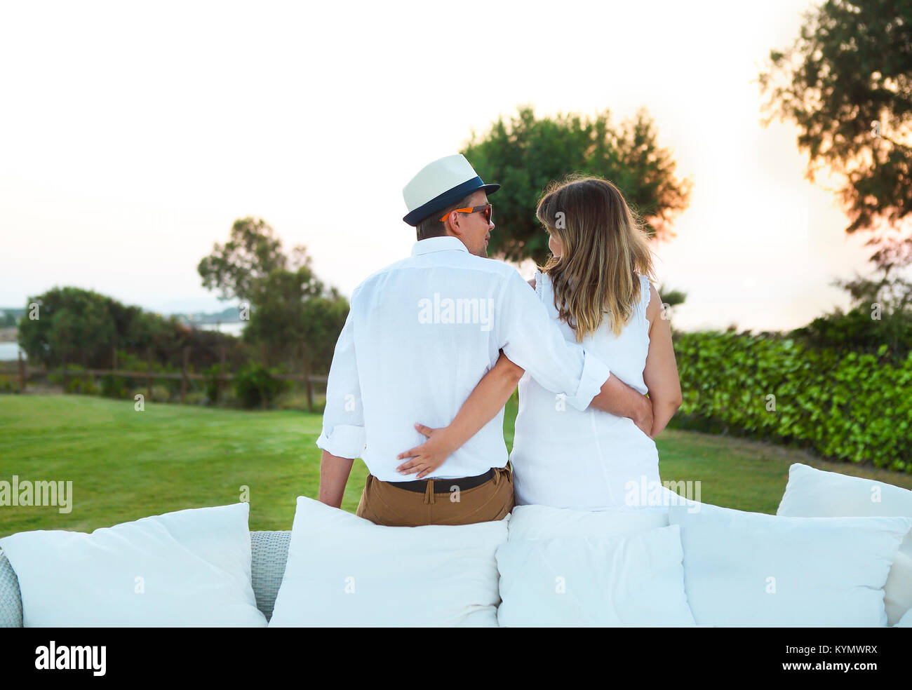 Happy young couple hugging together outdoors Stock Photo - Alamy Happy young couple hugging together outdoors Stock Photo - Alamy