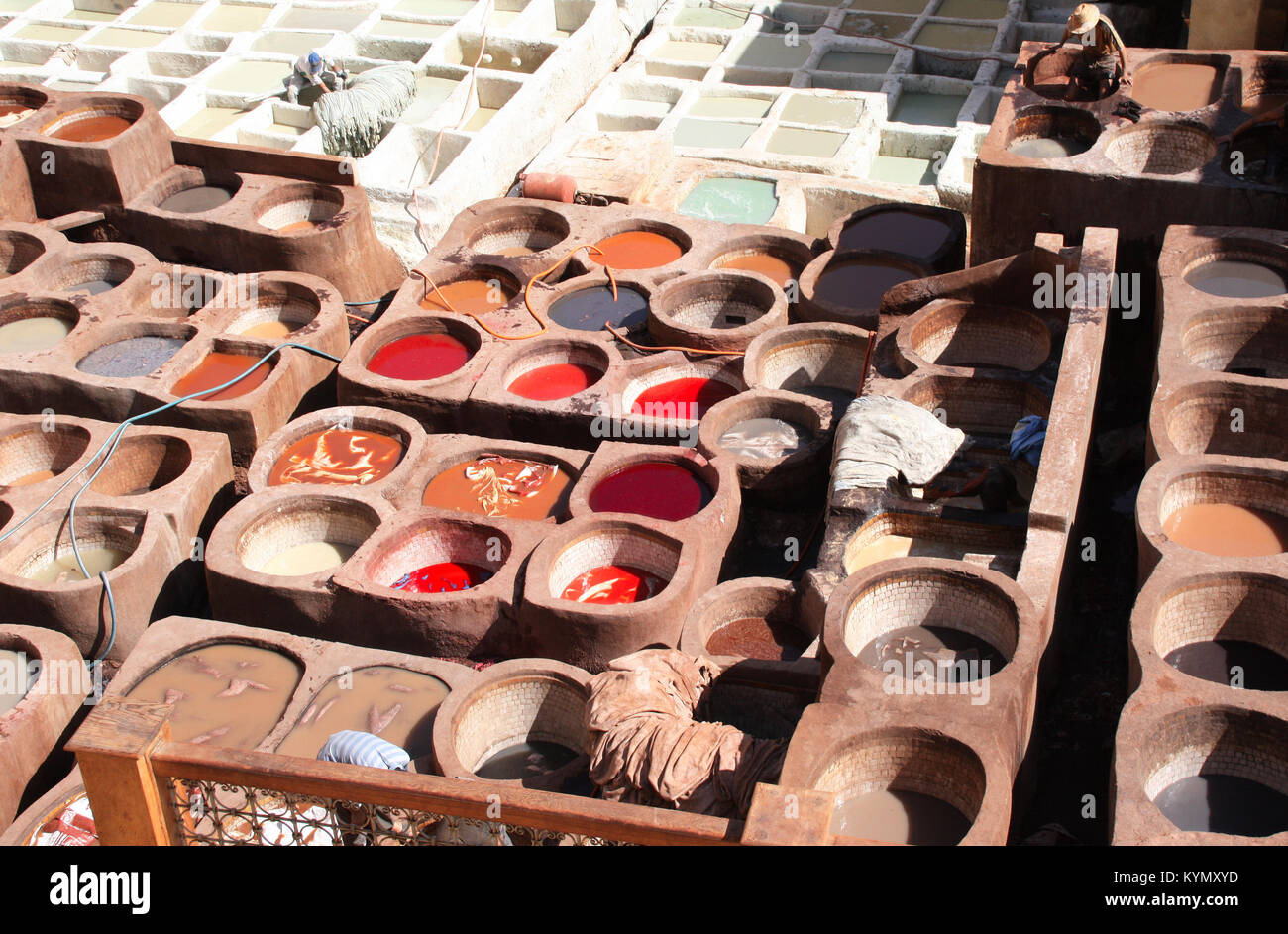 Coloration of leather in a traditional tannery in the city Fes, Morocco ...