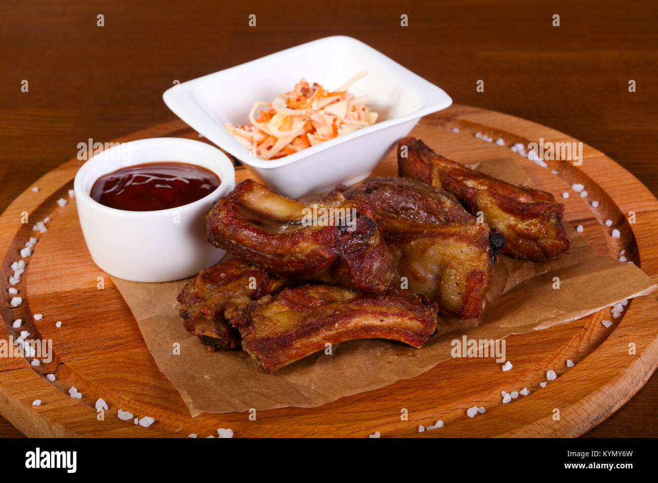 Pork ribs with sauce and cabbage Stock Photo - Alamy
