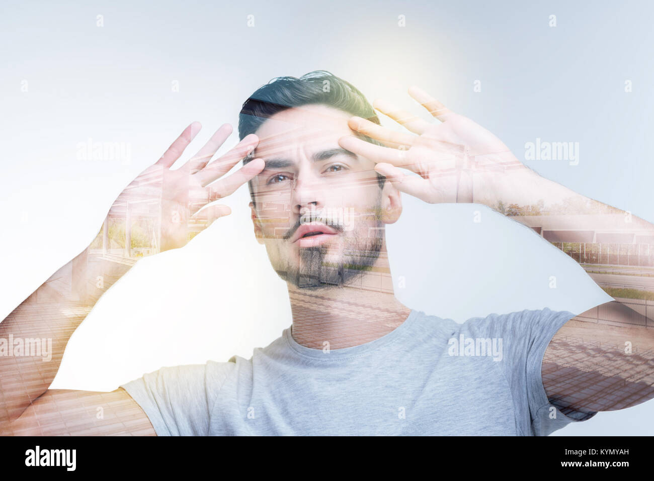 Bearded creative man looking for inspiration Stock Photo - Alamy