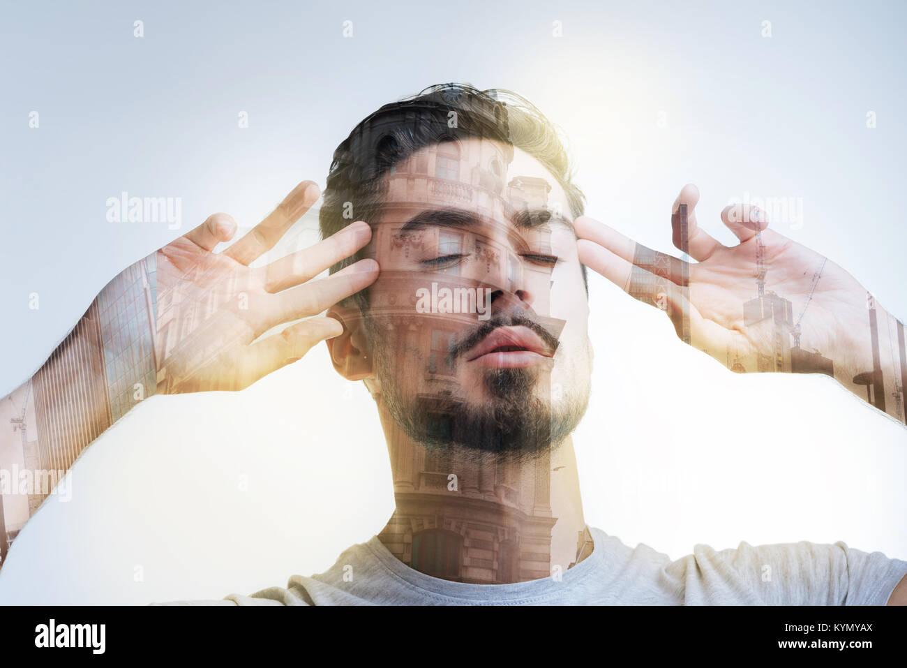 Appealing inspired man coming up with ideas Stock Photo - Alamy