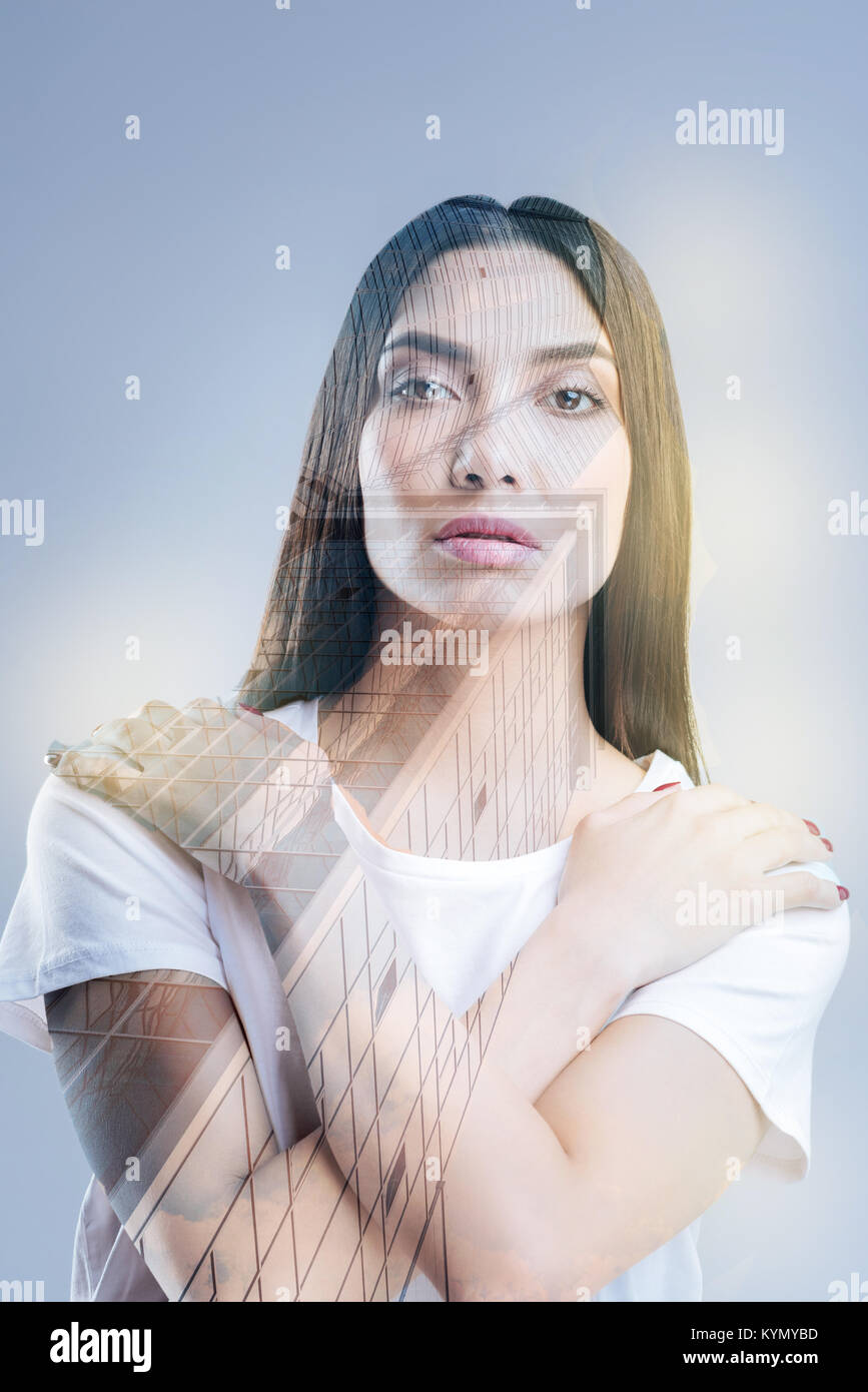 Reflective wonderful woman feeling vulnerable Stock Photo - Alamy