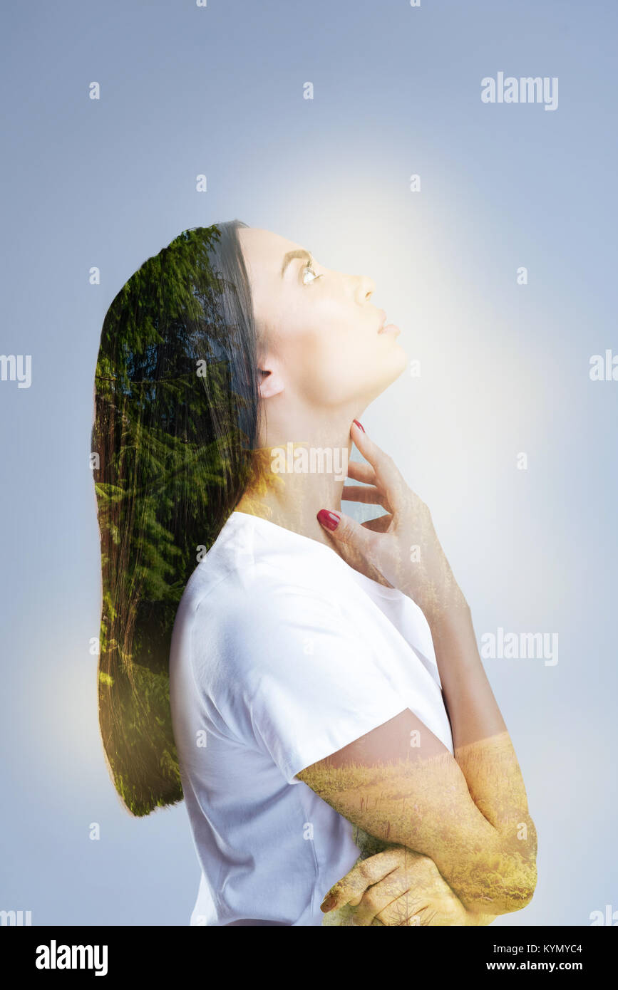 Inspired beautiful woman letting go her imaginatio Stock Photo - Alamy