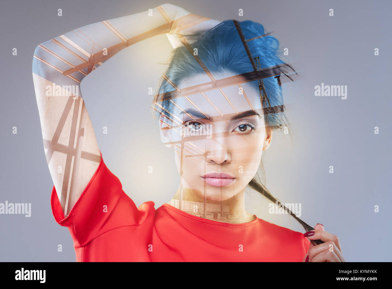 Brunette earnest woman creating chaos Stock Photo - Alamy