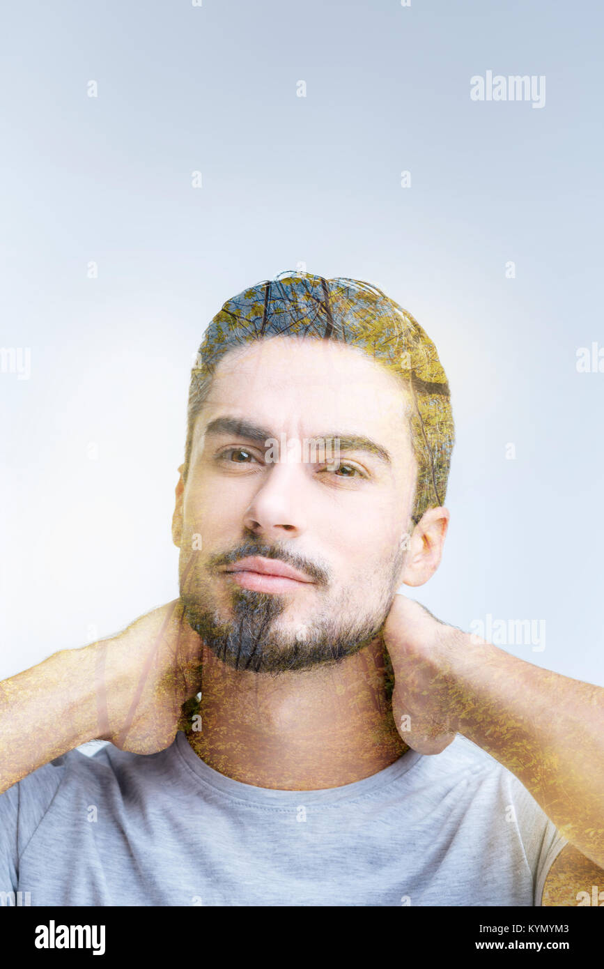 Pleased bearded man satisfied with results Stock Photo - Alamy