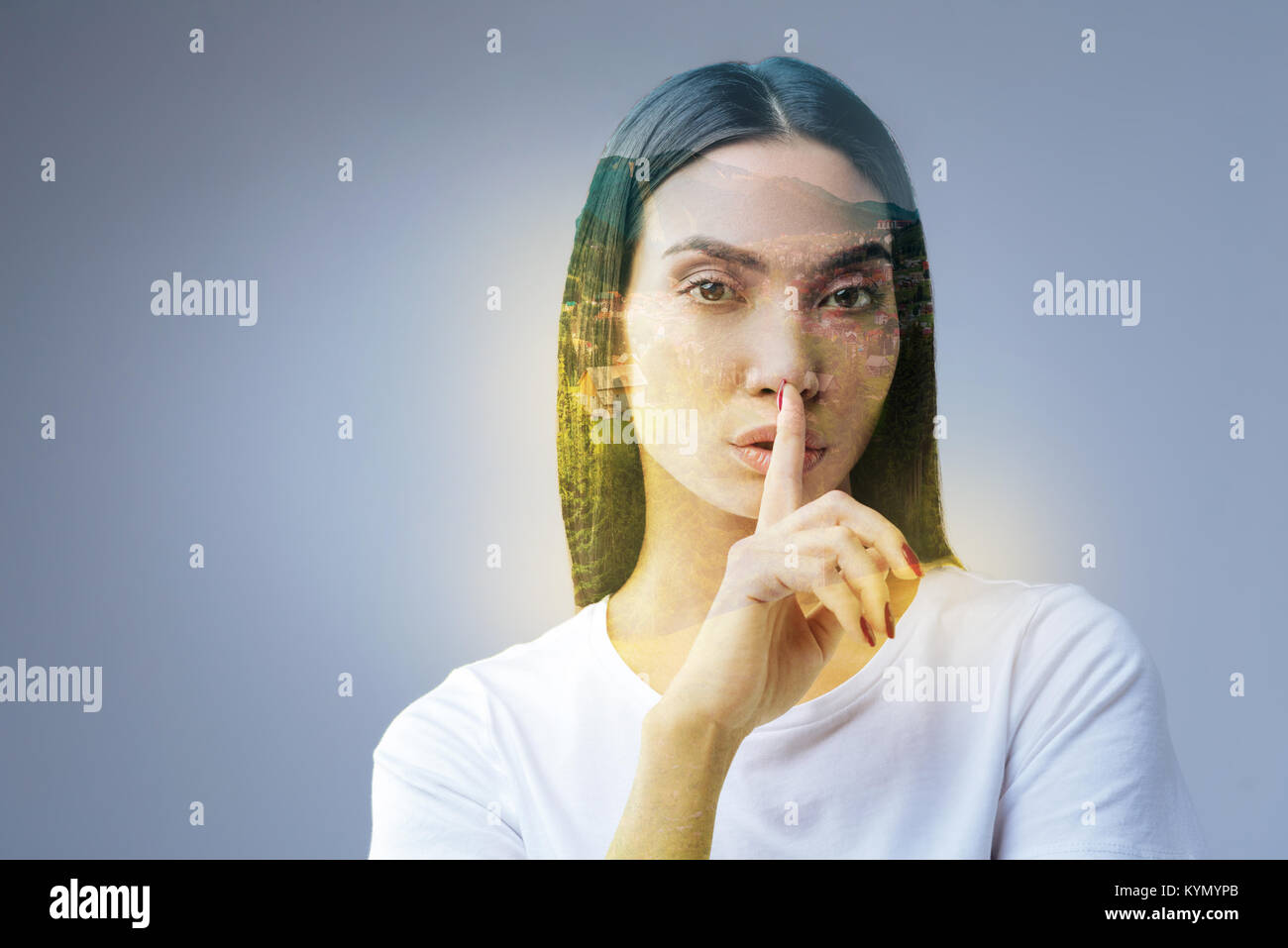 Mysterious facial expression hi-res stock photography and images - Alamy