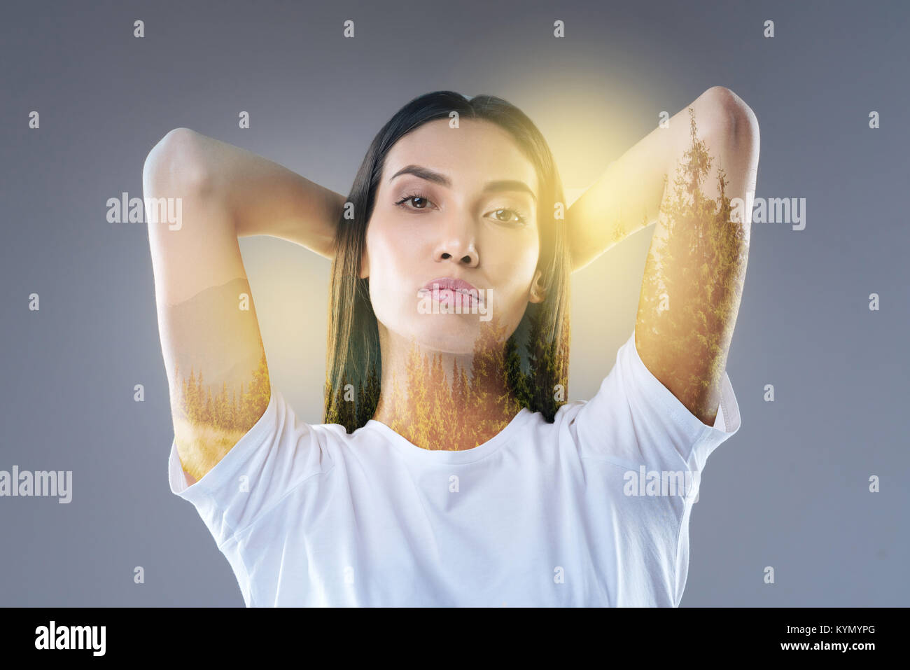 Serious attractive woman eager to create Stock Photo - Alamy
