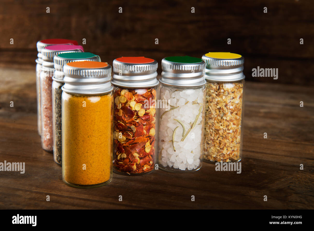 Spices Set in Mini Bottles, such as basil, turmeric, salts, chilli ...
