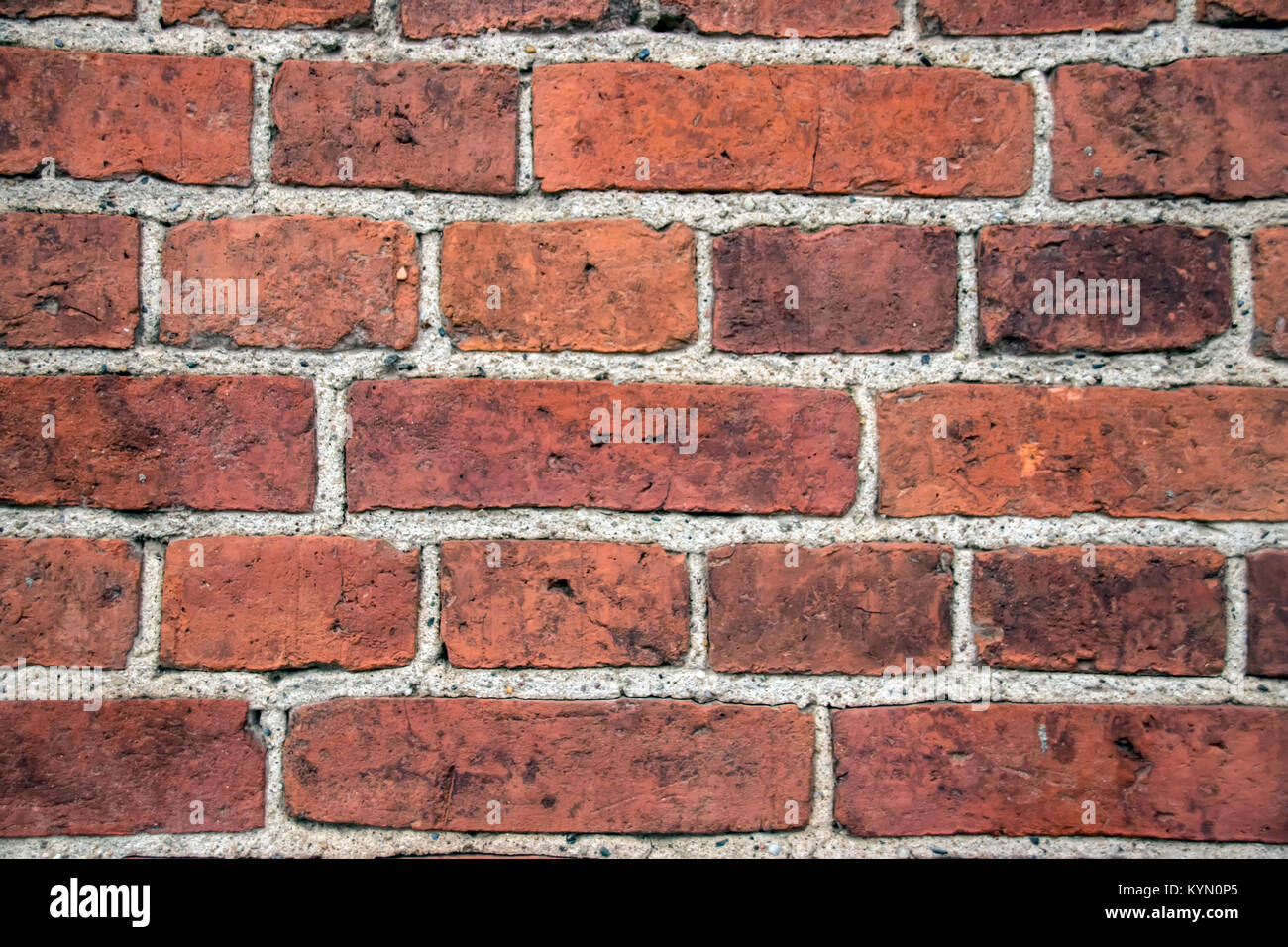 Wall of baked brown bricks Stock Photo - Alamy