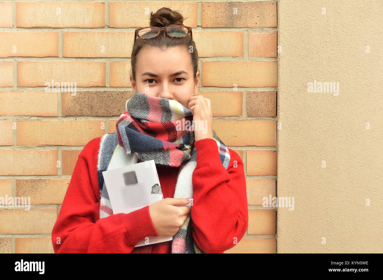 Young asian girl by brick wall hi-res stock photography and images - Alamy