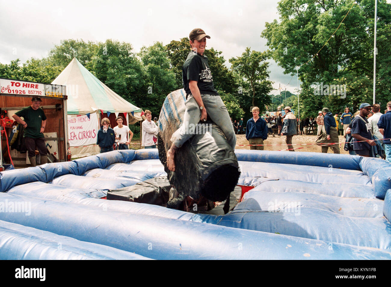 Bucking bronco ride at the Glastonbury Festival 1998, Somerset, England ...