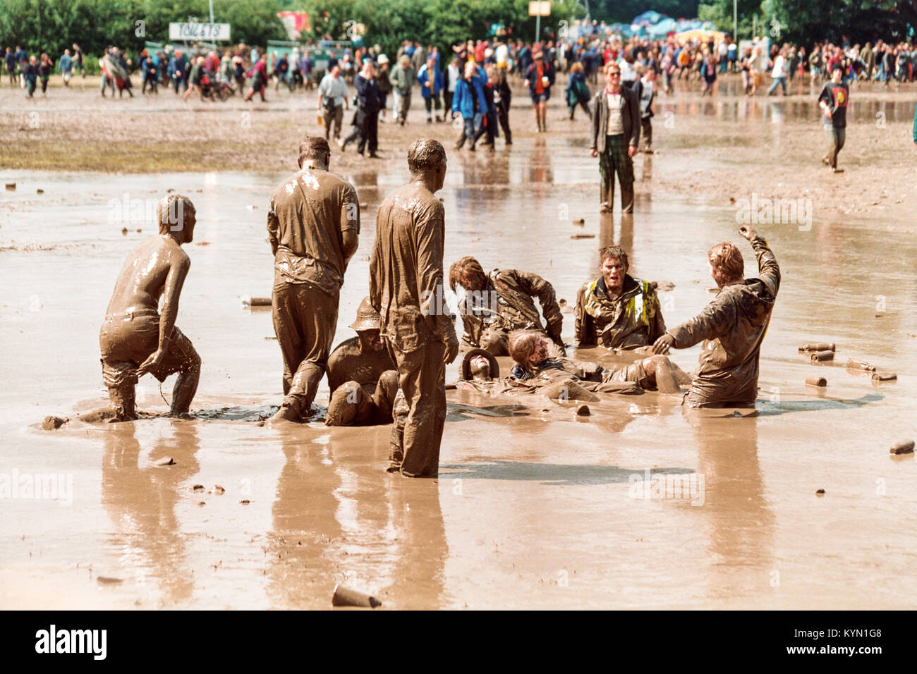 Fun in the mud, Muddy festival goers at The Glastonbury Festival 1998 ...