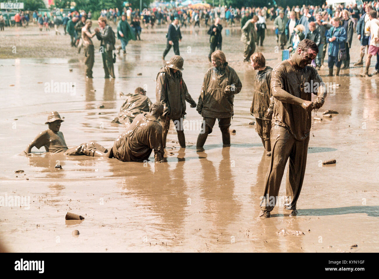 Fun in the mud, Muddy festival goers at The Glastonbury Festival 1998 ...