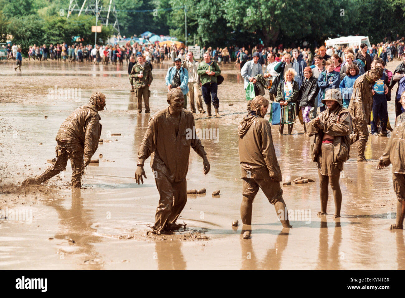 Fun in the mud, Muddy festival goers at The Glastonbury Festival 1998 ...