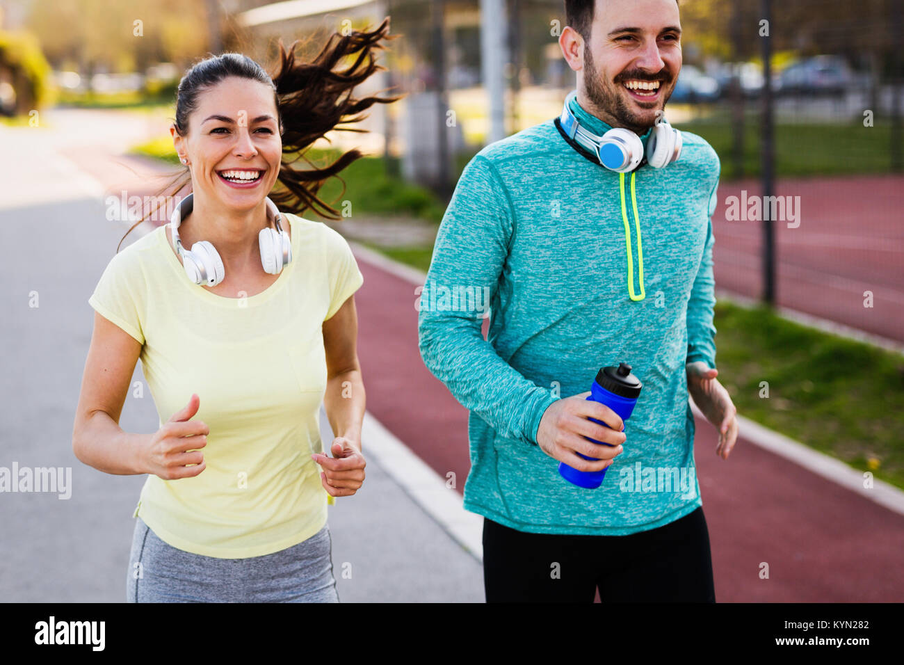 Lovely couple running together hi-res stock photography and images - Alamy