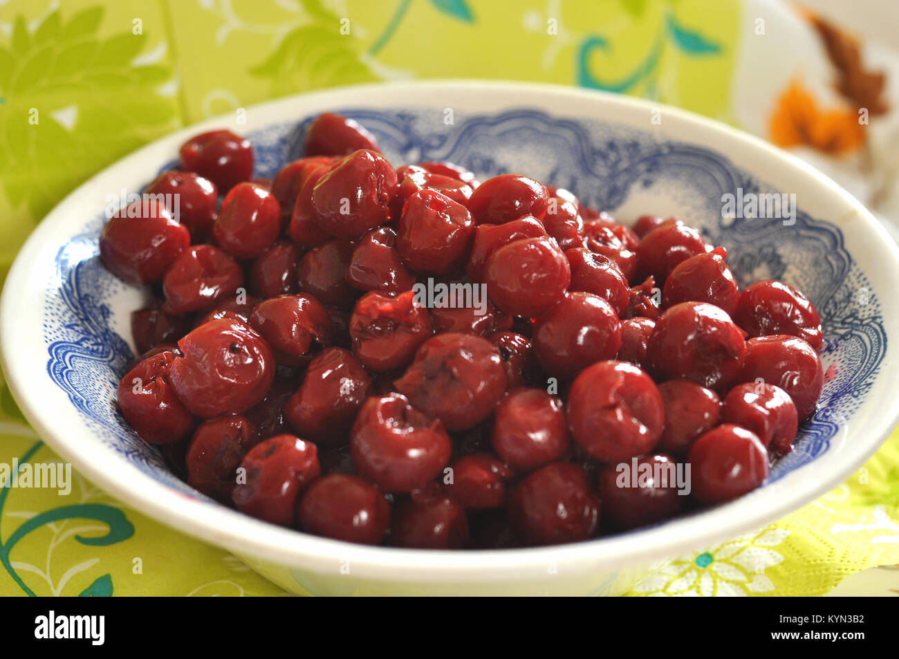 A bowl with pitted cherries, cooking process. Top view Stock Photo - Alamy