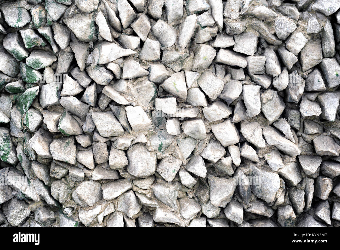 Grey triangle shaped rock chippings and stones in a triangle shapes ...