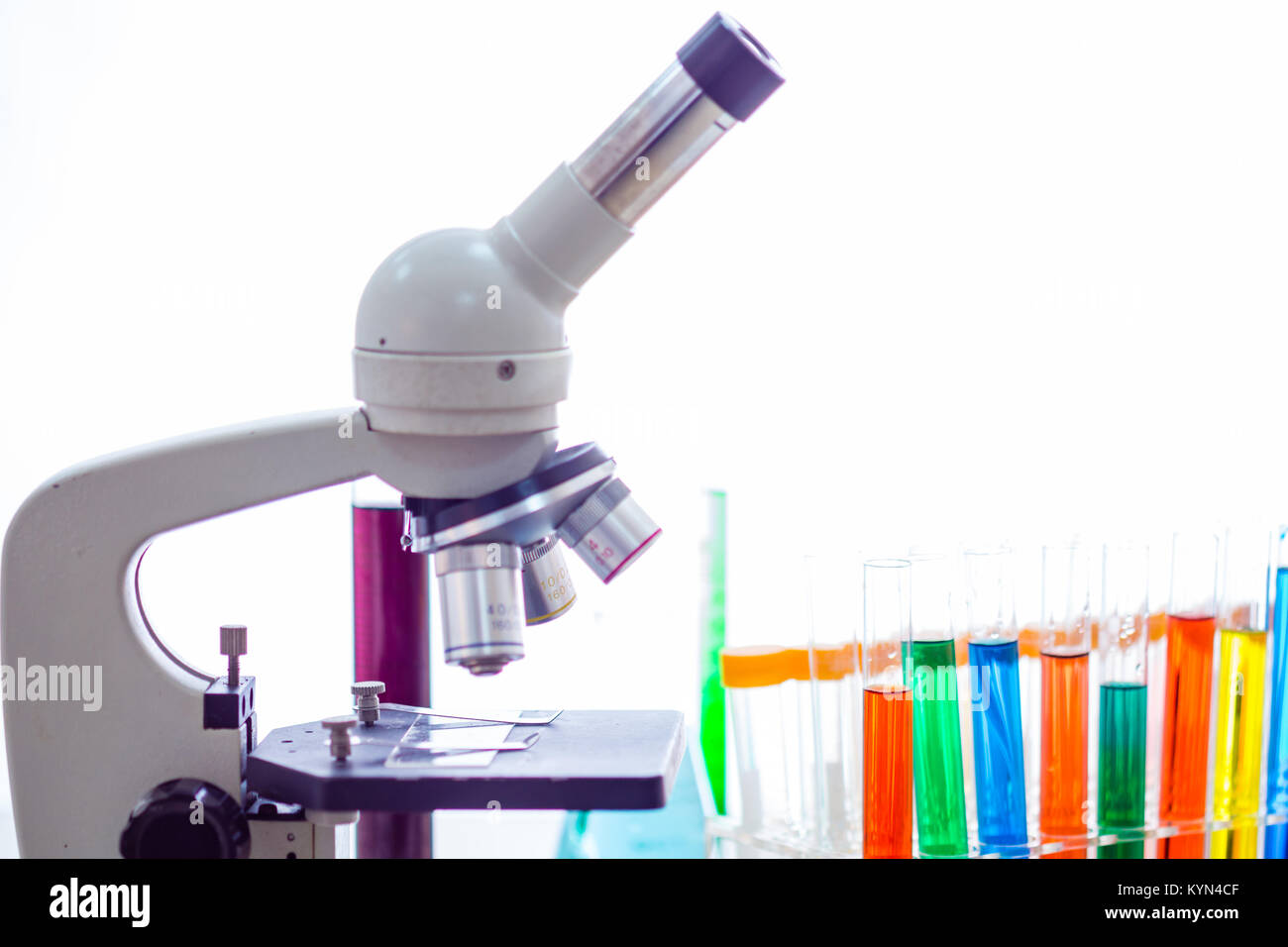 Test tubes, sample vials, and microscopes in school science lab for ...