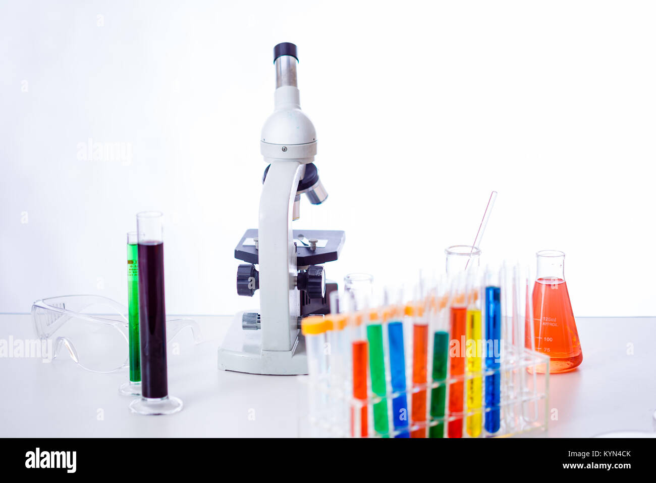 Test tubes, sample vials, and microscopes in school science lab for ...