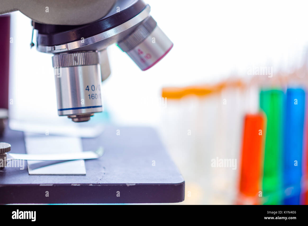 Test tubes, sample vials, and microscopes in school science lab for ...