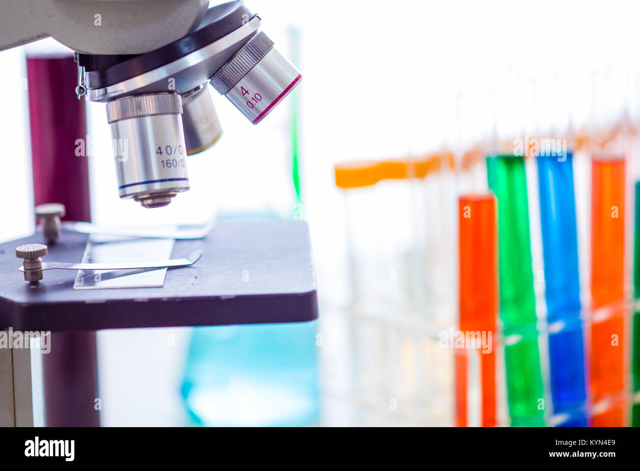 Test tubes, sample vials, and microscopes in school science lab for ...